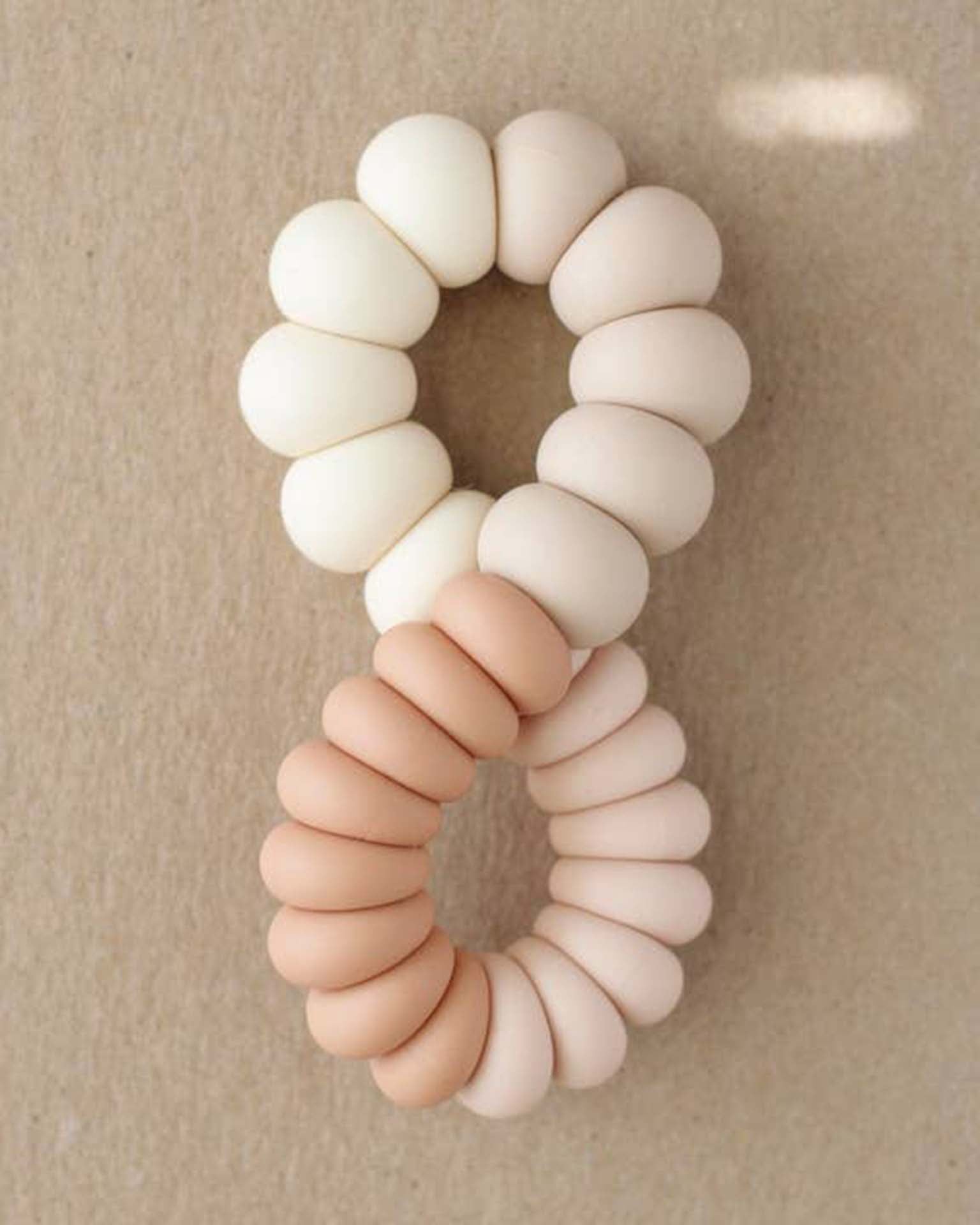 twist freezer teether in coral – Little